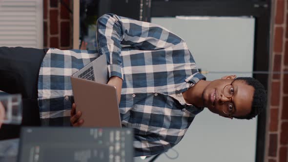Vertical Video Portrait of African American Software Developer Holding ...