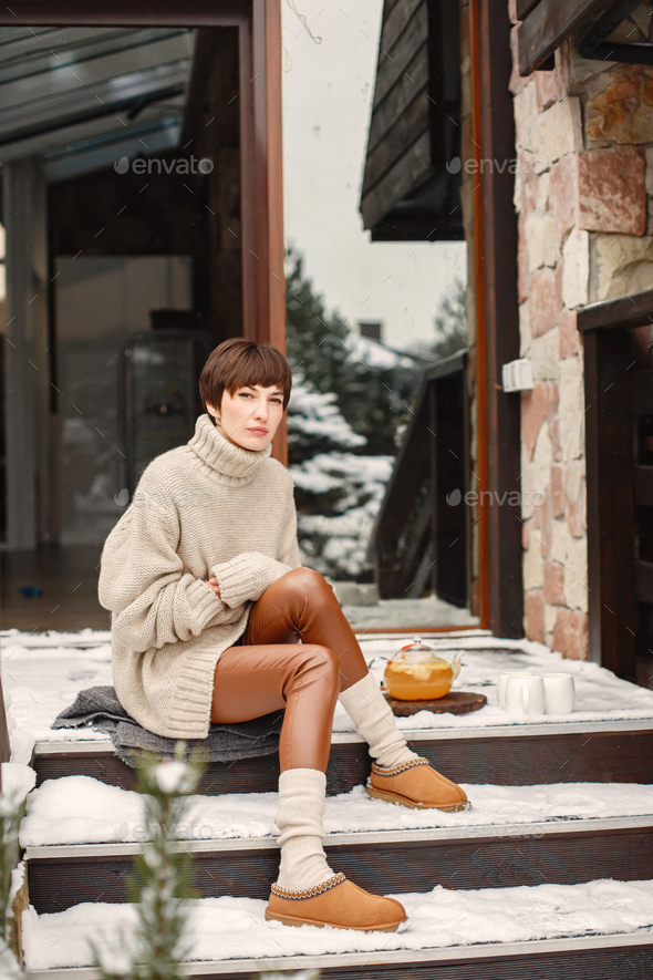 Outdoor photo of cozy female on the terrace Stock Photo by prostooleh