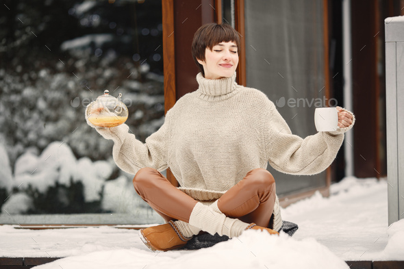 Outdoor photo of cozy female on the terrace Stock Photo by prostooleh