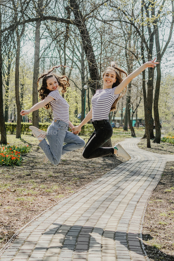 Gen z girls enjoying outdoors, expressing positive emotions. Outdoor ...