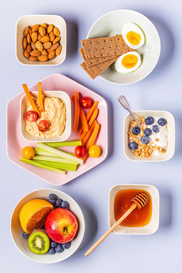 Healthy snack on a pastel background. Stock Photo by tatiana_bralnina