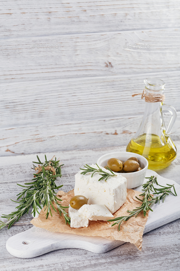 Fresh feta cheese with rosemary Stock Photo by svittlana | PhotoDune