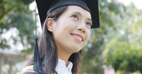Side profile of woman get graduation Stock Photo by leungchopan | PhotoDune
