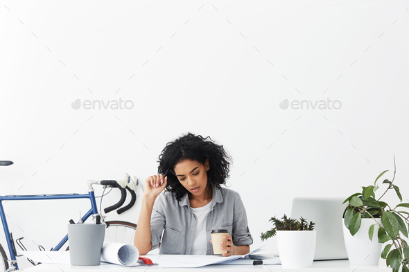 Overwork concept. Young mixed race woman engineer dressed casually ...