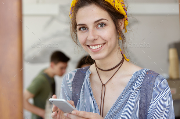 Horizontal portrait of pleasant-looking woman with healthy skin warm ...