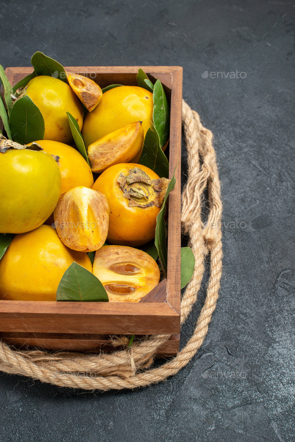 front view fresh sweet persimmons inside box on dark floor tree taste ...