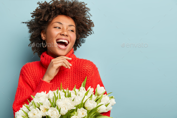 Pleasant human emotions and feelings concept. Cheerful black lady with ...