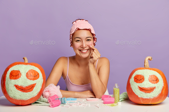Hygiene, beauty and pampering concept. Happy Asian woman makes korean ...