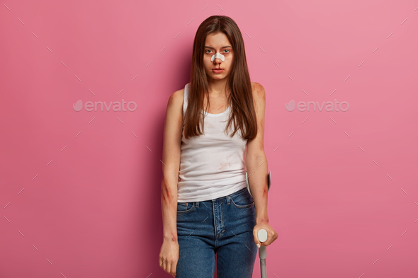 Young female has serious injury, bleeding wound, suffers from recurring ...