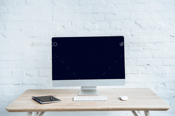 Modern work space with computer screen and keyboard on table Stock ...