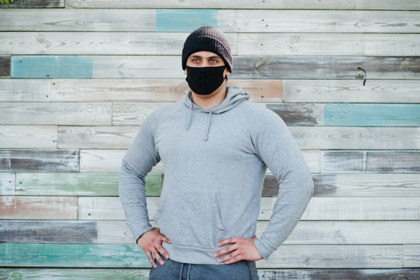 Sport arabian man in black medical face mask Stock Photo by ASphotostudio