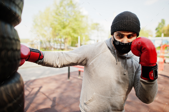 Sport arabian man in black medical face mask Stock Photo by ASphotostudio