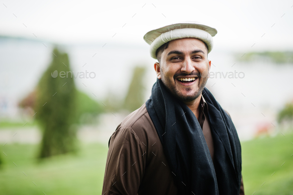 Pakistani pathan man wear traditional clothes. Stock Photo by ASphotostudio