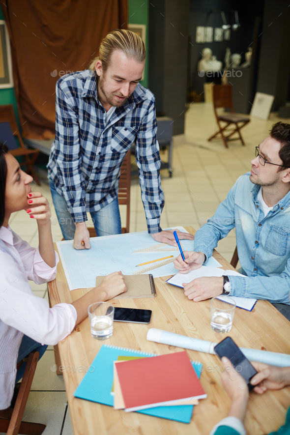 Teaching Stock Photo by Pressmaster | PhotoDune