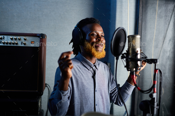 Recording songs Stock Photo by Pressmaster | PhotoDune