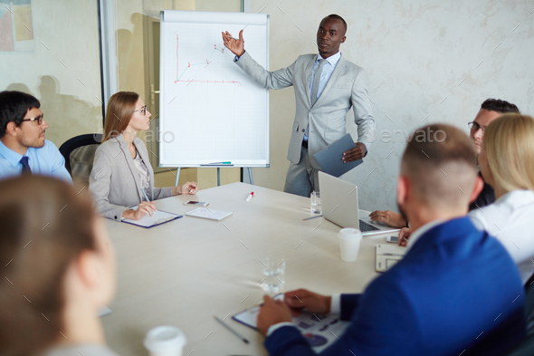 Presentation in office Stock Photo by Pressmaster | PhotoDune