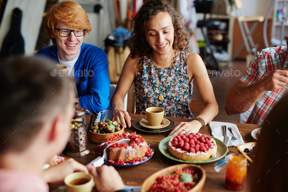 Talk during dinner Stock Photo by Pressmaster | PhotoDune