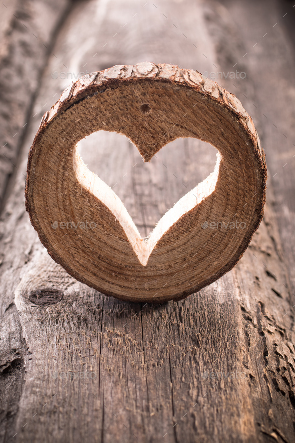 Light heart on rustic wooden background Stock Photo by natika | PhotoDune