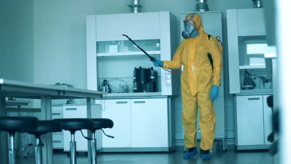 Sanitation Inspector Is Spraying Chemicals in the Laboratory, Stock Footage