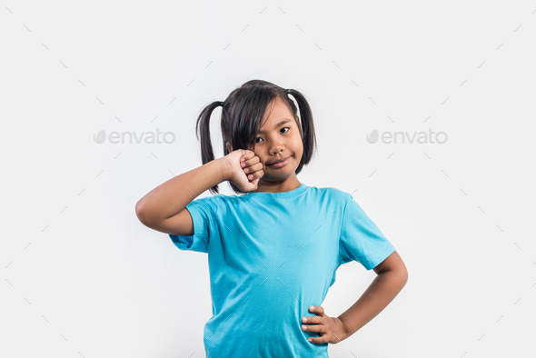 Portrait of Funny little girl acting in studio shot Stock Photo by ...