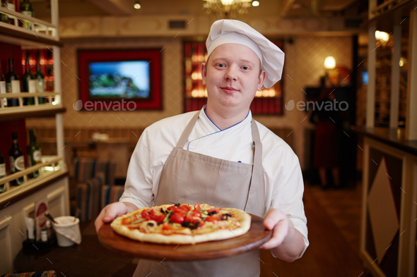 Chef with pizza Stock Photo by Pressmaster | PhotoDune