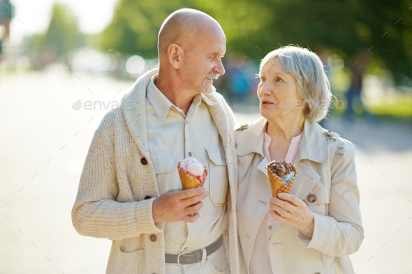 Seniors with ice-cream Stock Photo by Pressmaster | PhotoDune
