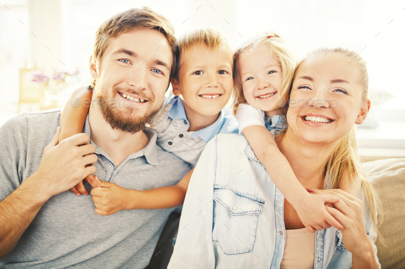 We are the happiest family in the world Stock Photo by Pressmaster