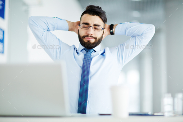 Relaxed man Stock Photo by Pressmaster | PhotoDune