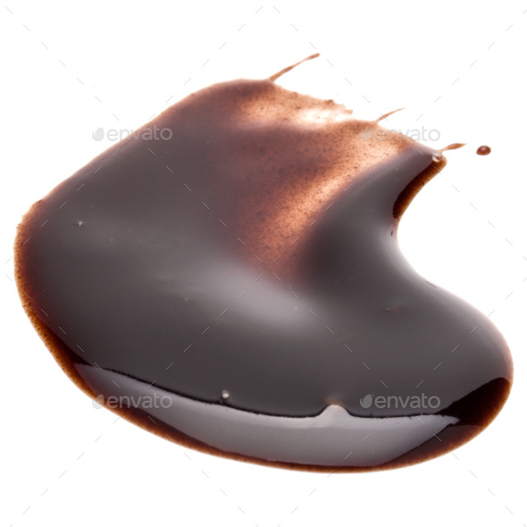 Chocolate syrup drop isolated on white background Stock Photo by natika