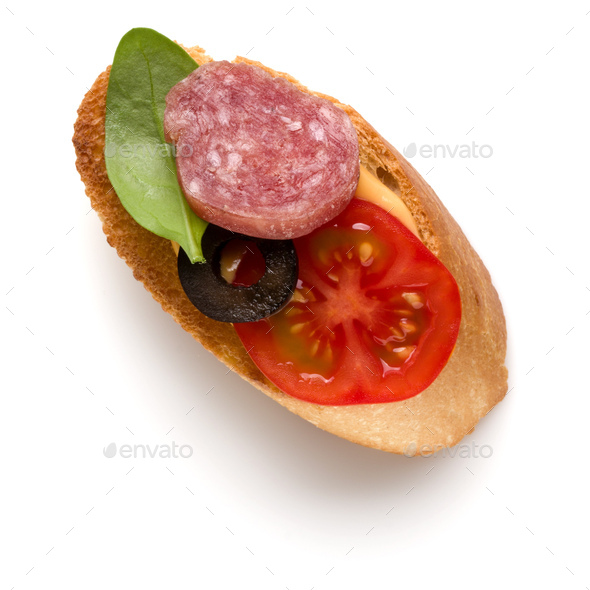 Open faced sandwich canape or crostini isolated on white background ...