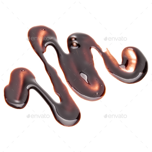 Chocolate syrup drop isolated on white background Stock Photo by natika