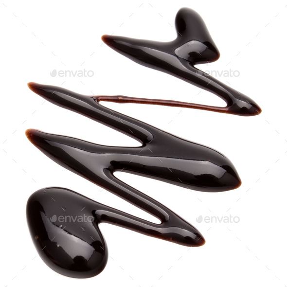 Chocolate syrup drop isolated on white background Stock Photo by natika