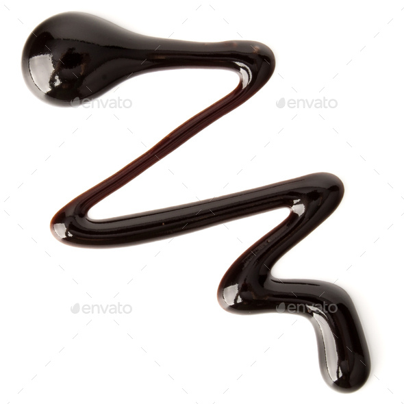 Chocolate syrup drop isolated on white background. Top view. Stock ...