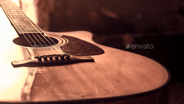 acoustic guitar close-up on a beautiful colored background Stock Photo ...