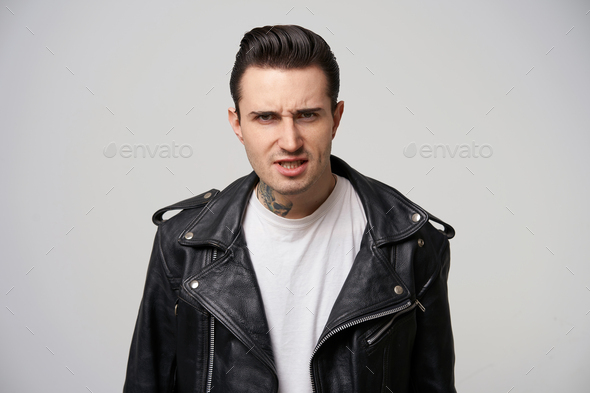 Indoor photo of attractively smiling young rocker man Stock Photo by ...