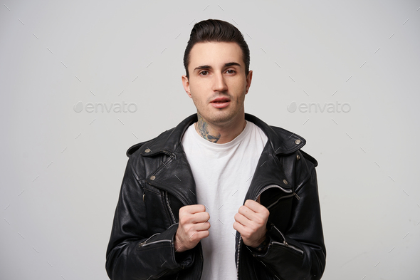 Indoor photo of attractively smiling young rocker man Stock Photo by ...