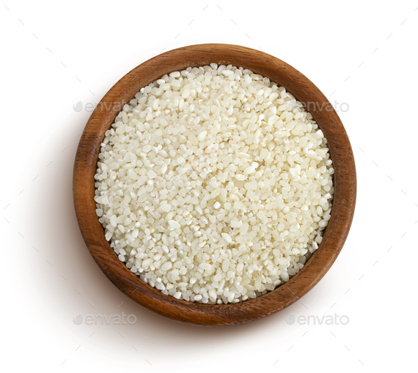 Crushed rice in wooden bowl isolated on white background Stock Photo by ...