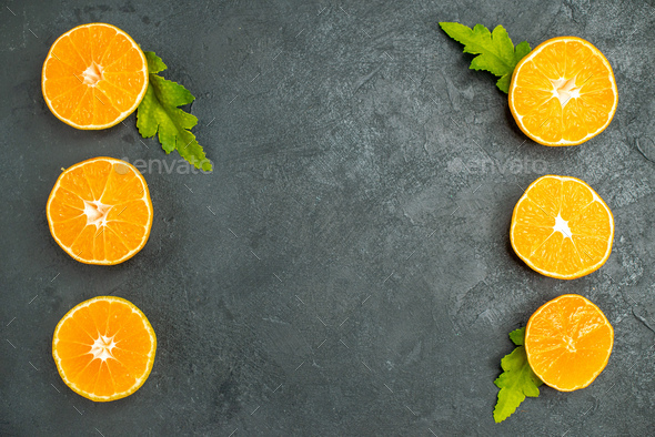 top view vertical row cut oranges on dark background free space Stock ...