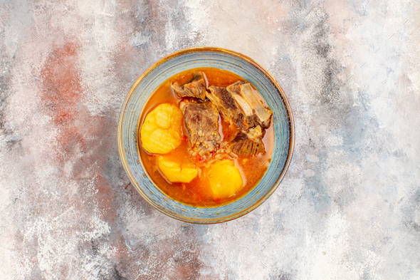 top view bozbash soup on nude background azerbaijani cuisine with copy ...