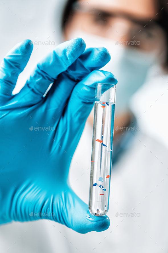 Microplastics in a test tube with water sample Stock Photo by microgen