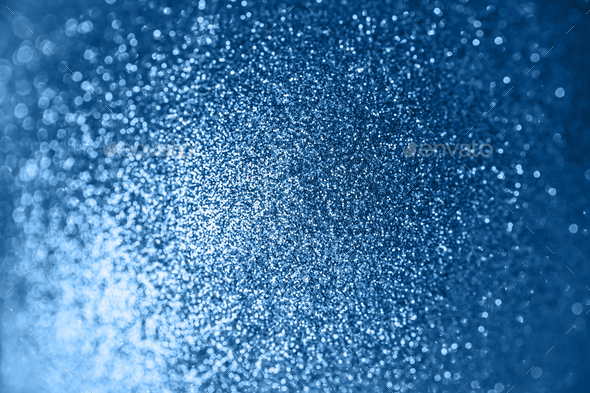 Blue background with glitter. Shining flare blurred bokeh texture ...
