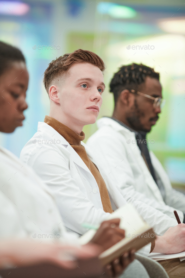 Male Medical Student in Lecture Stock Photo by seventyfourimages ...