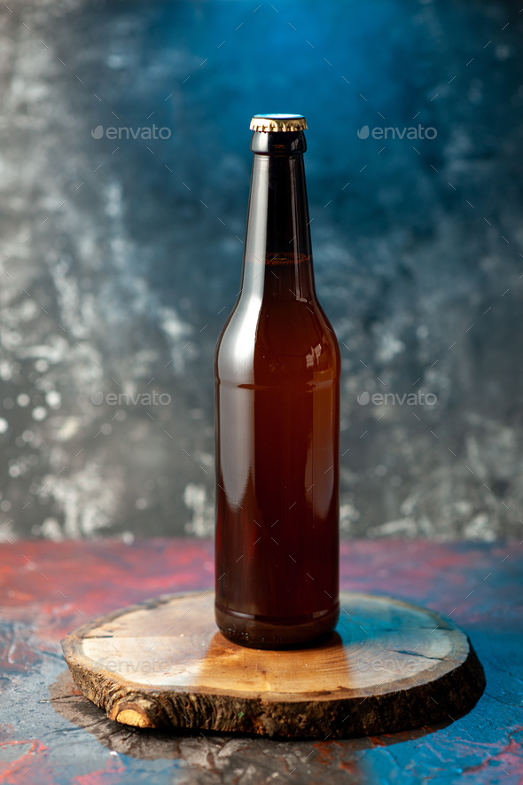 front view bottle of bear on blue background alcohol wine drink photo ...