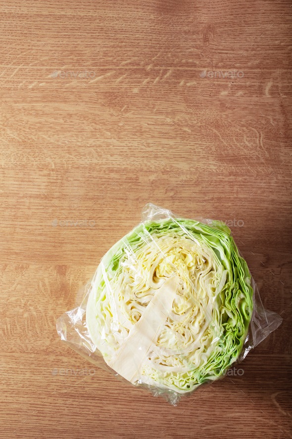 cabbage vegetable in plastic bag. single use plastic packaging issue ...