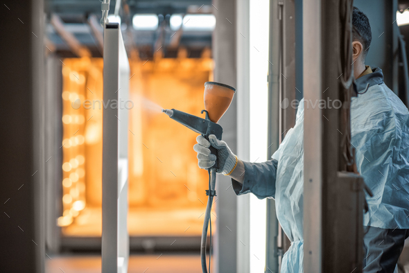 Powder coating process of metal products Stock Photo by RossHelen ...