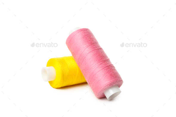Spools of thread isolated on white background Stock Photo by AtlasComposer