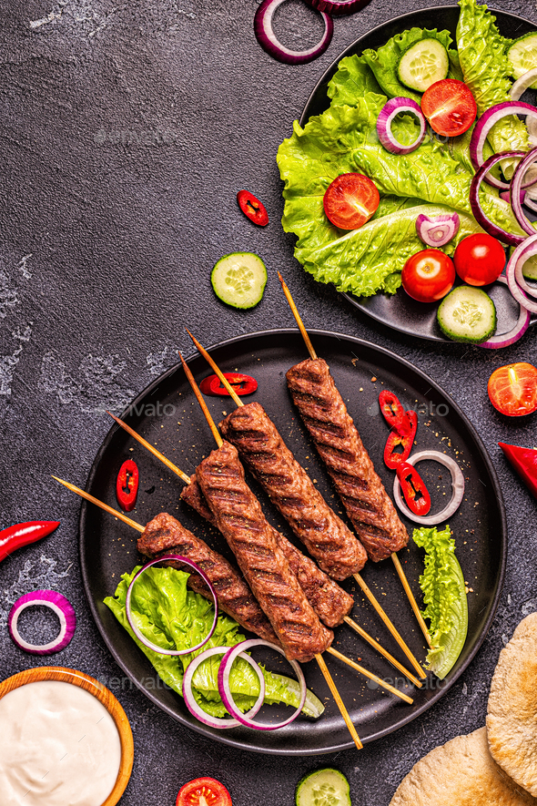 Traditional middle eastern, arabic or mediterranean meat kebab with ...