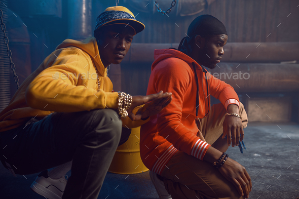 Two stylish rappers poses in studio Stock Photo by NomadSoul1 | PhotoDune