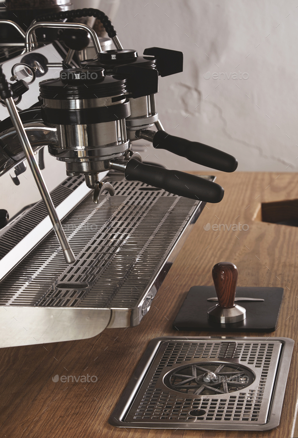 Side view professional coffee machine in shop Stock Photo by bublikhaus