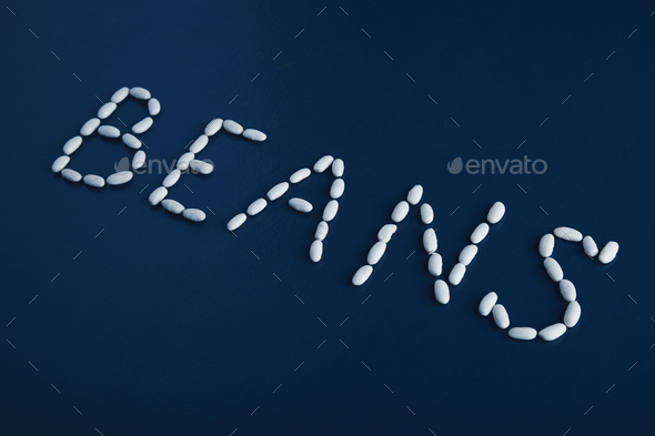 beans word side view isolated Stock Photo by bublikhaus | PhotoDune